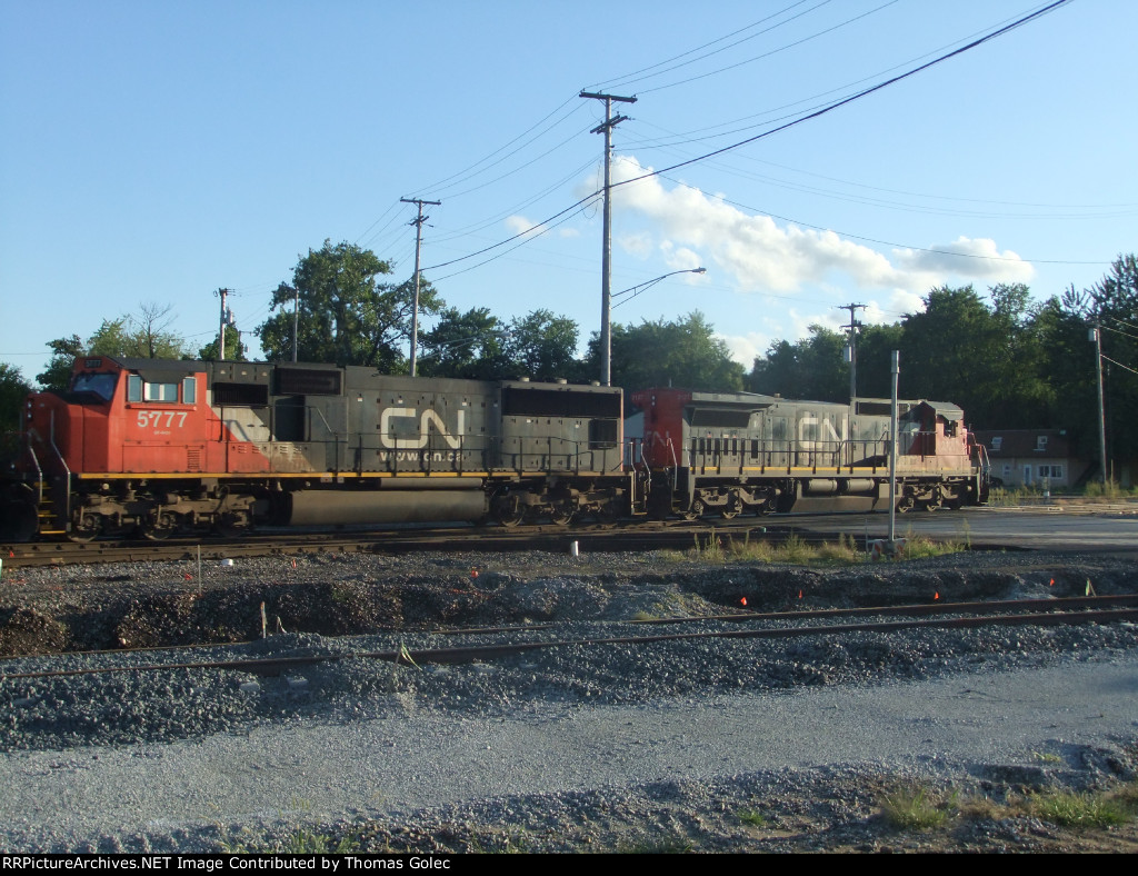 CN 2127 and CN 5777 lead a westbound manifest.